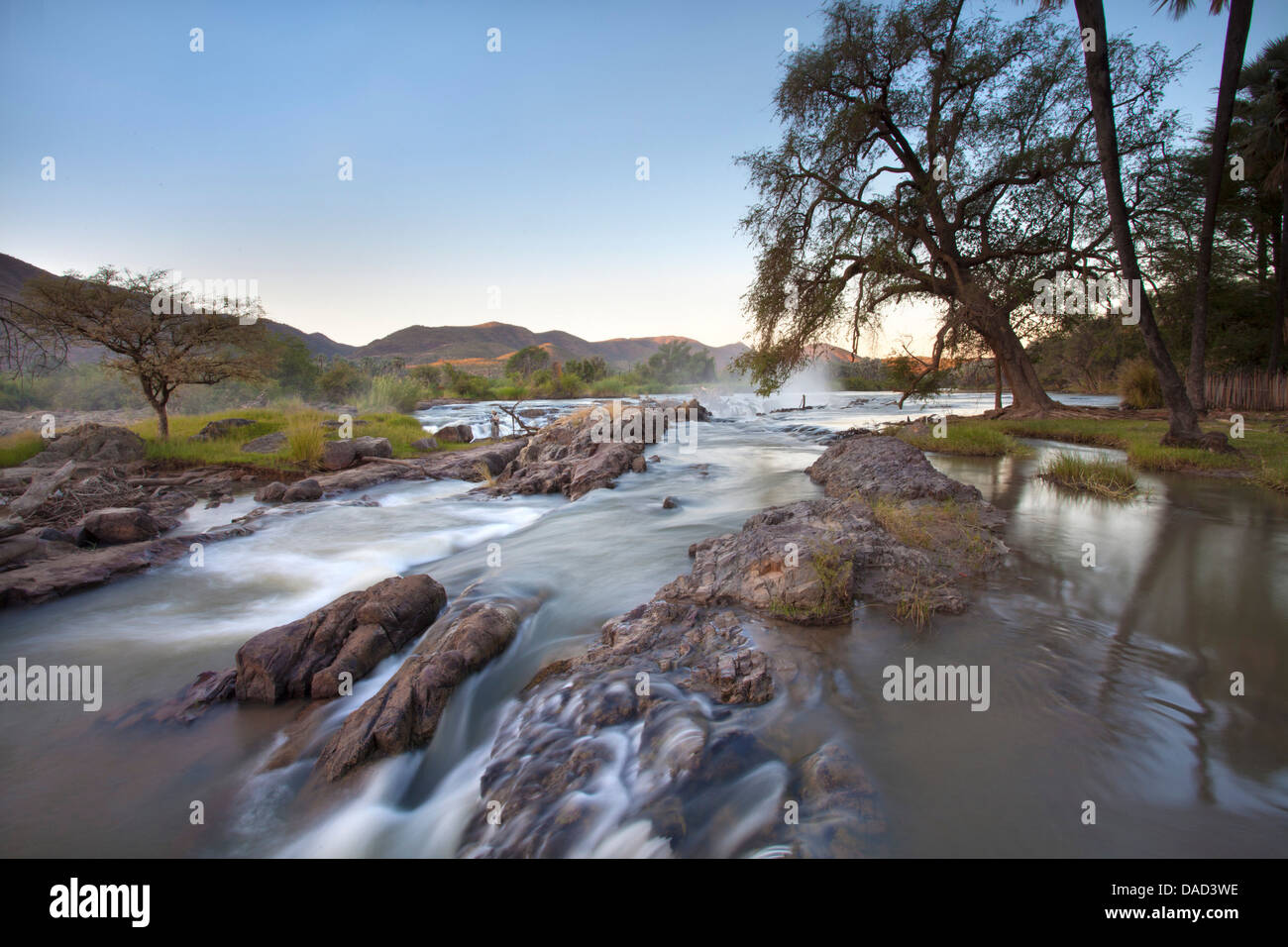 Kunene River which forms the border between Namibia and Angola, near ...