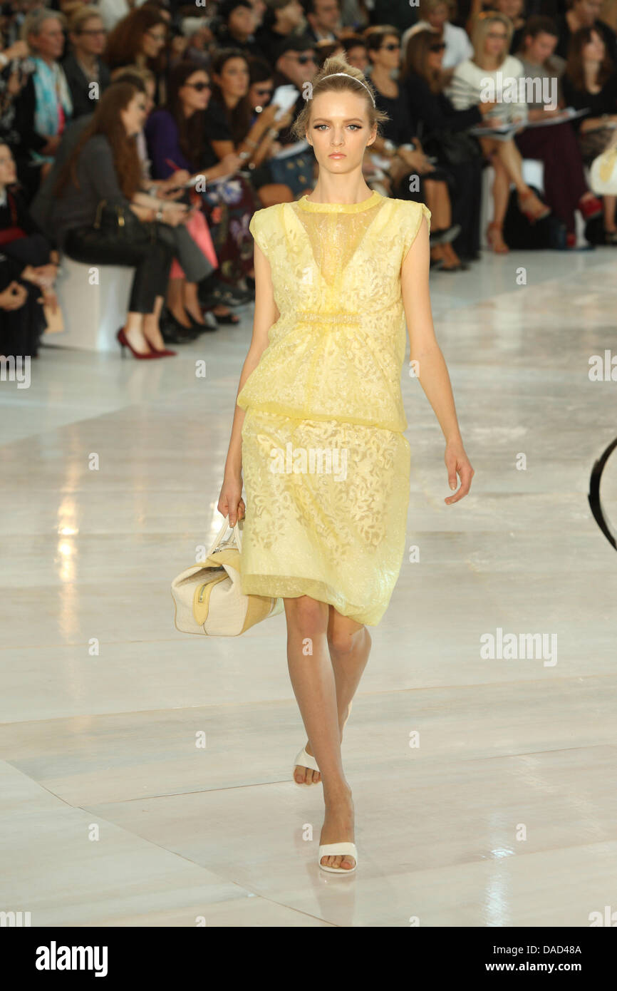 A model wears a creation by French designer Louis Vuitton as part of ...