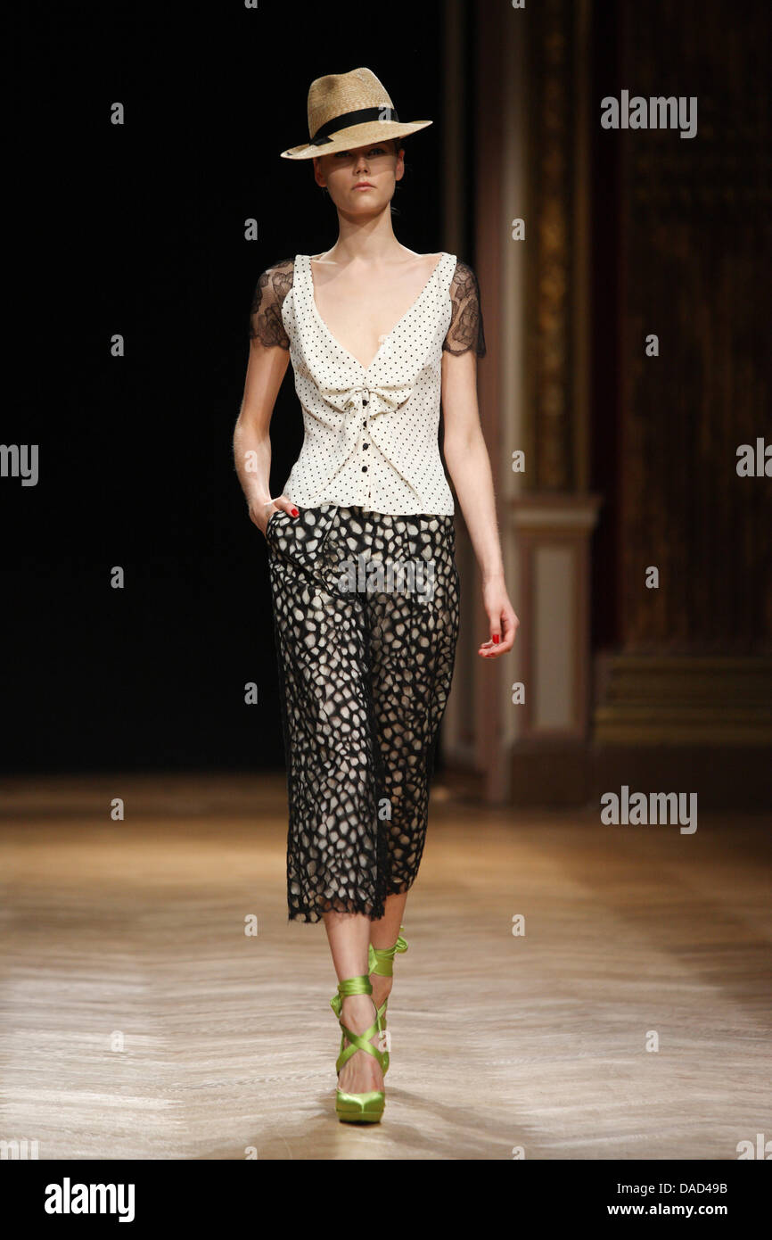 A model wears a creation by German designers Johnny Talbot and Adrian ...