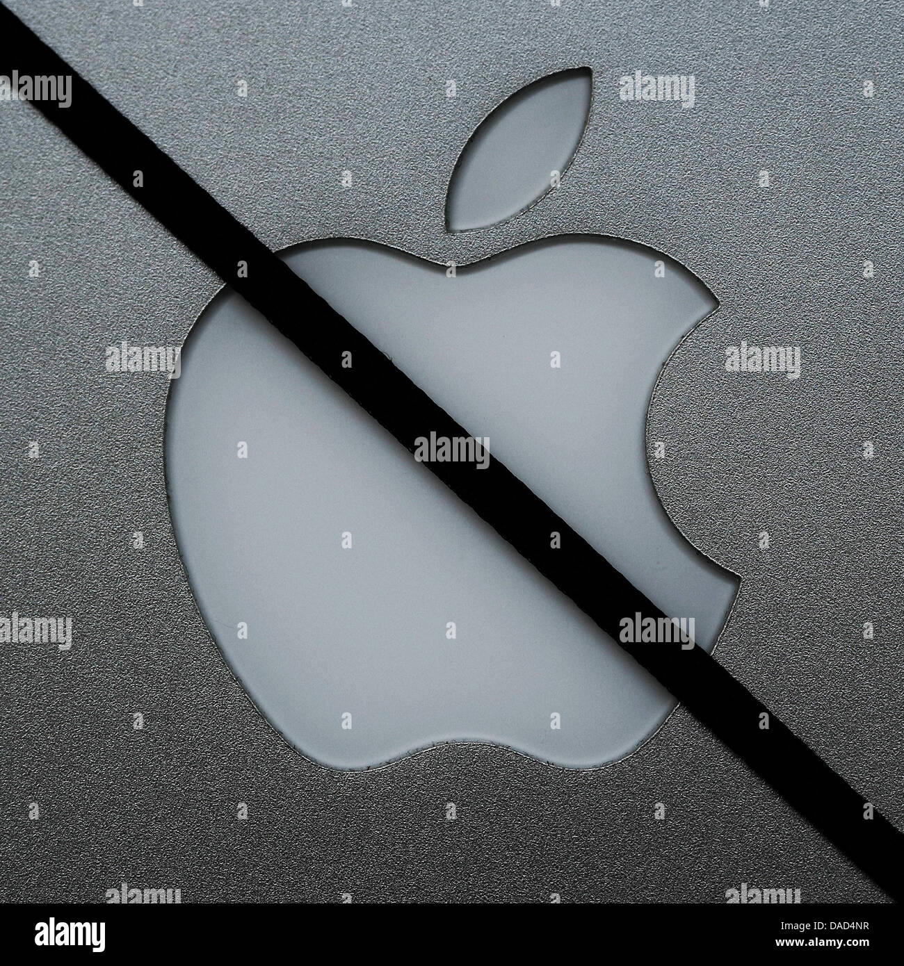 ILLUSTRATION - A black ribbon lies on the logo of the multinational ...