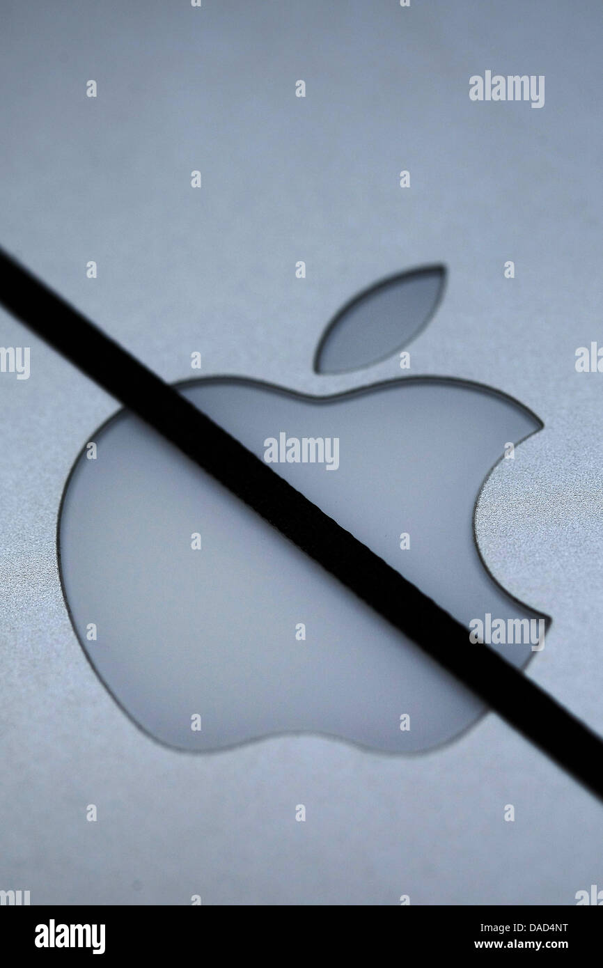 ILLUSTRATION - A black ribbon lies on the logo of the multinational ...