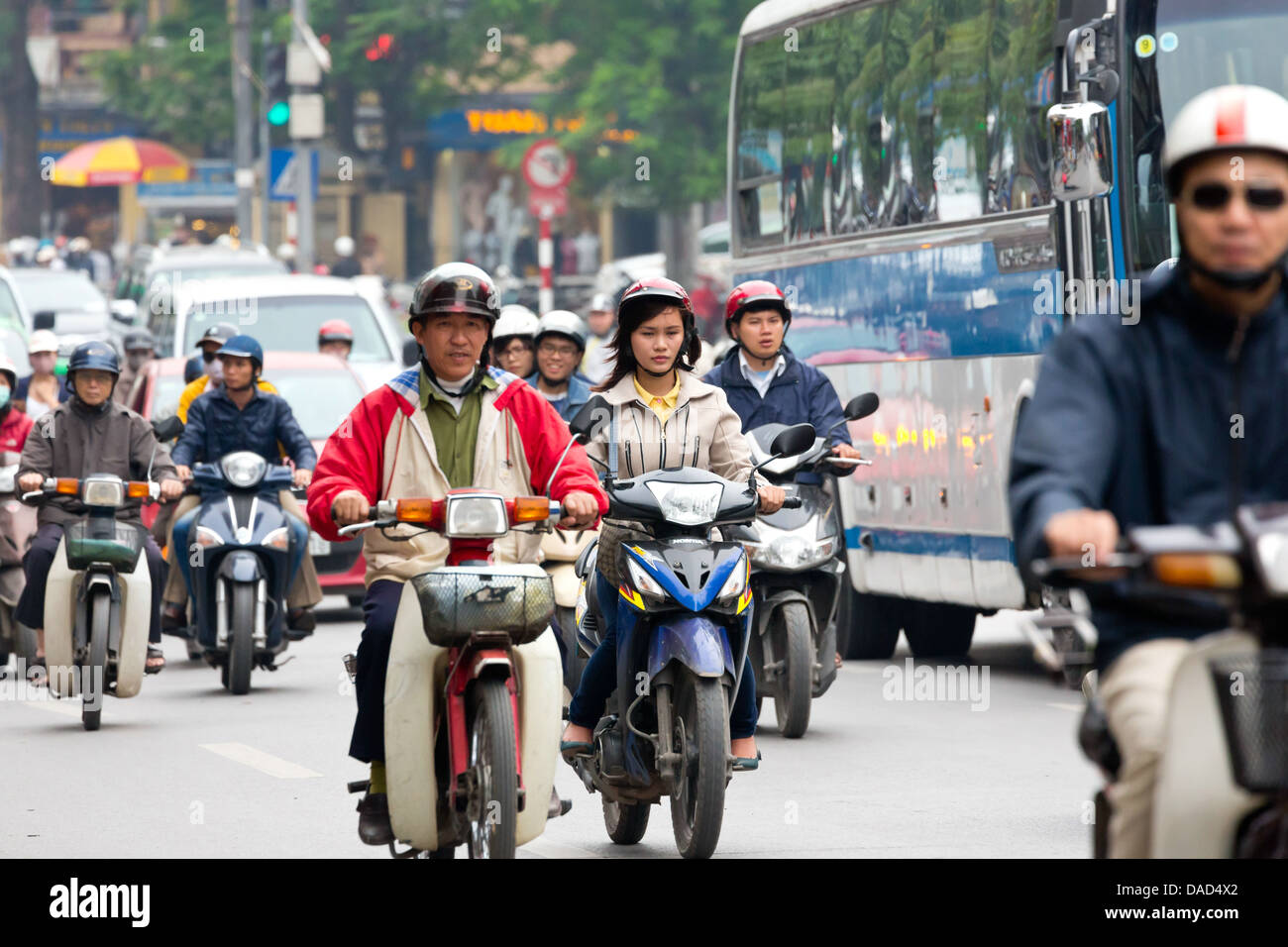 Scooter Drivers in Hanoi, Vietnam Stock Photo - Alamy