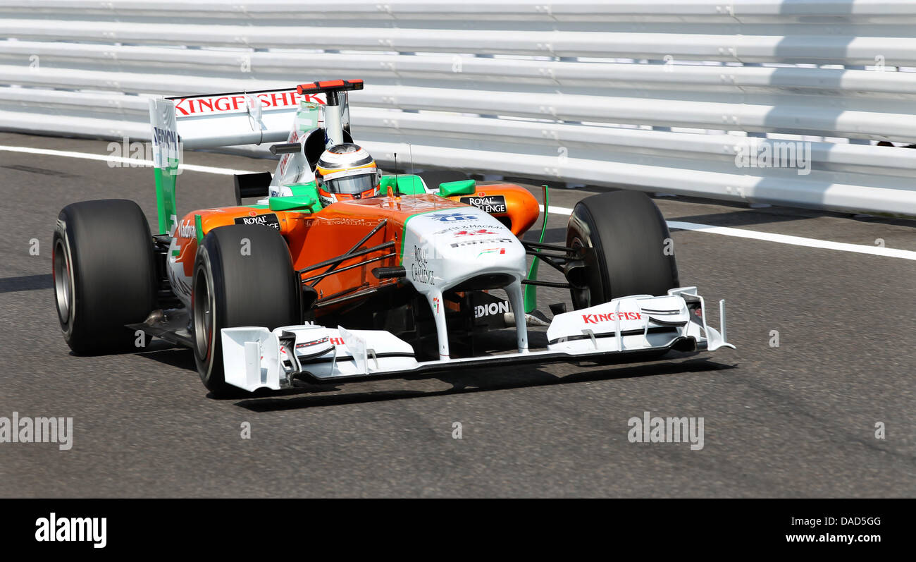 German Formula One driver Adrian Sutil of Force India stears his car ...