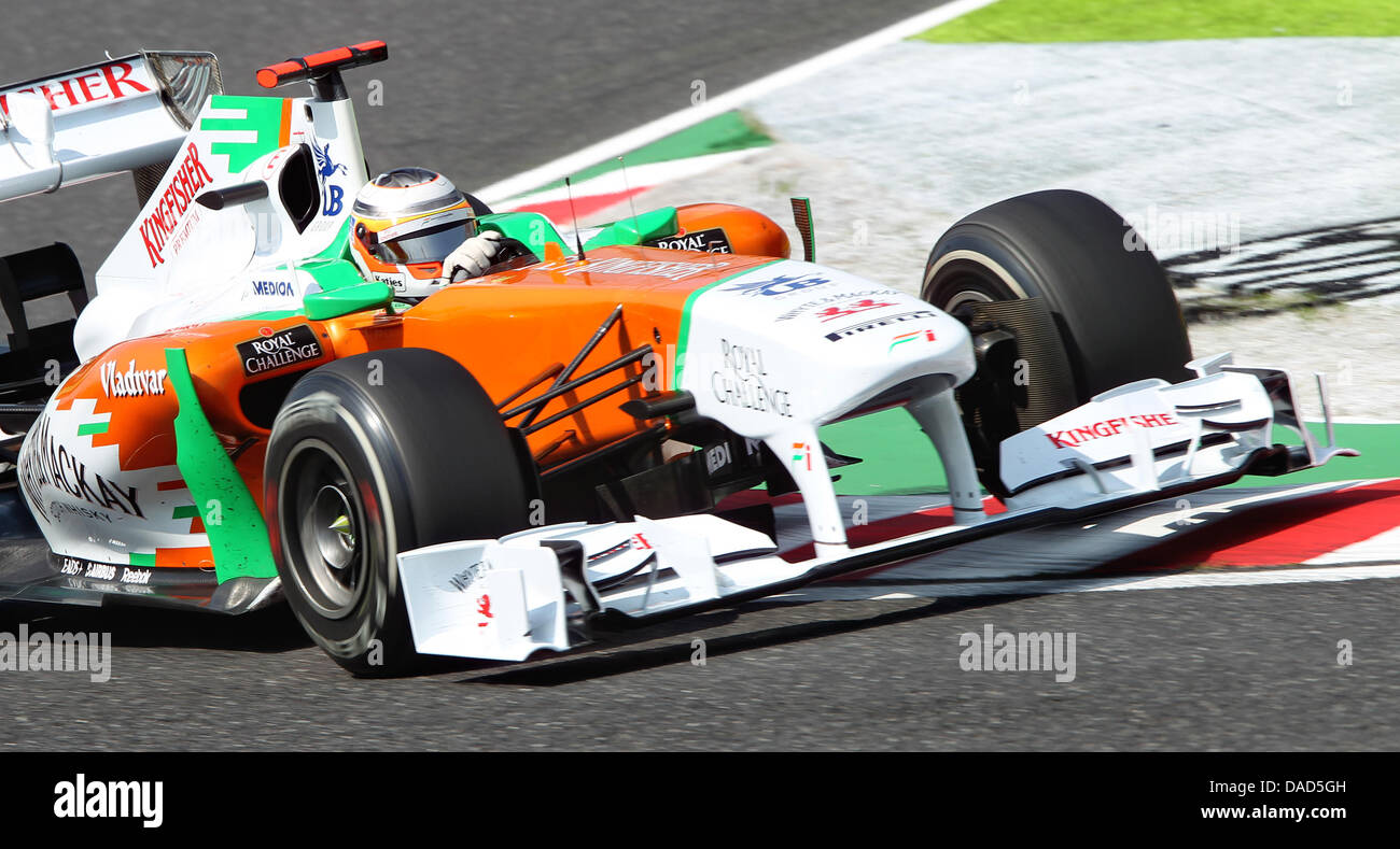 German Formula One driver Adrian Sutil of Force India stears his car ...