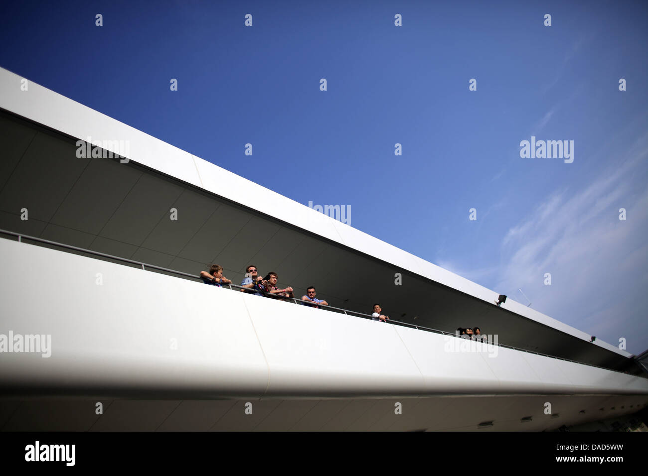 Spectators watch from the paddock building at the Suzuka Circuit in ...