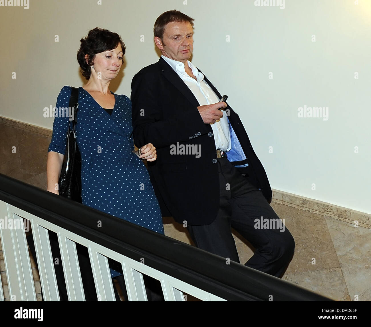 The Berlin Greens party chairman Volker Ratzmann and Ramona Pop leave ...