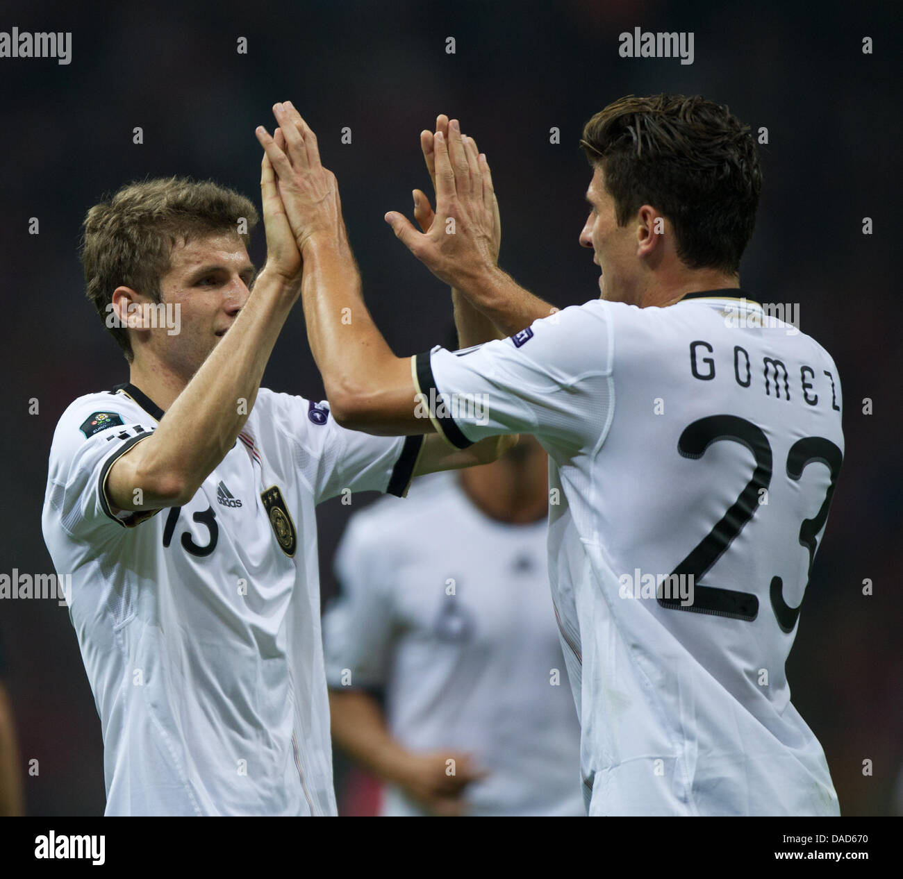 Germany's Mario Gomez (R) and Thomas Mueller (L) celebrates after Gomez ...
