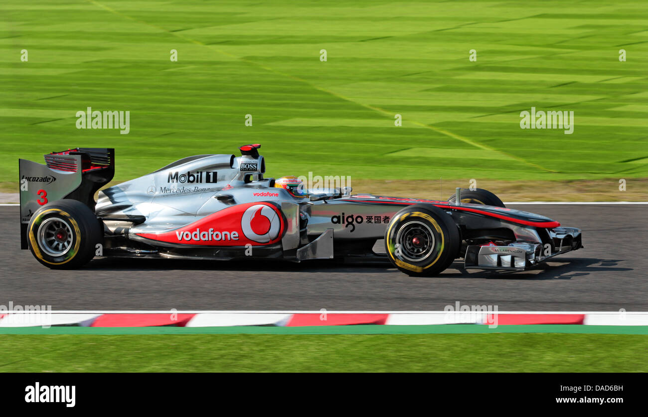 British Formula One driver Lewis Hamilton of McLaren Mercedes steers ...