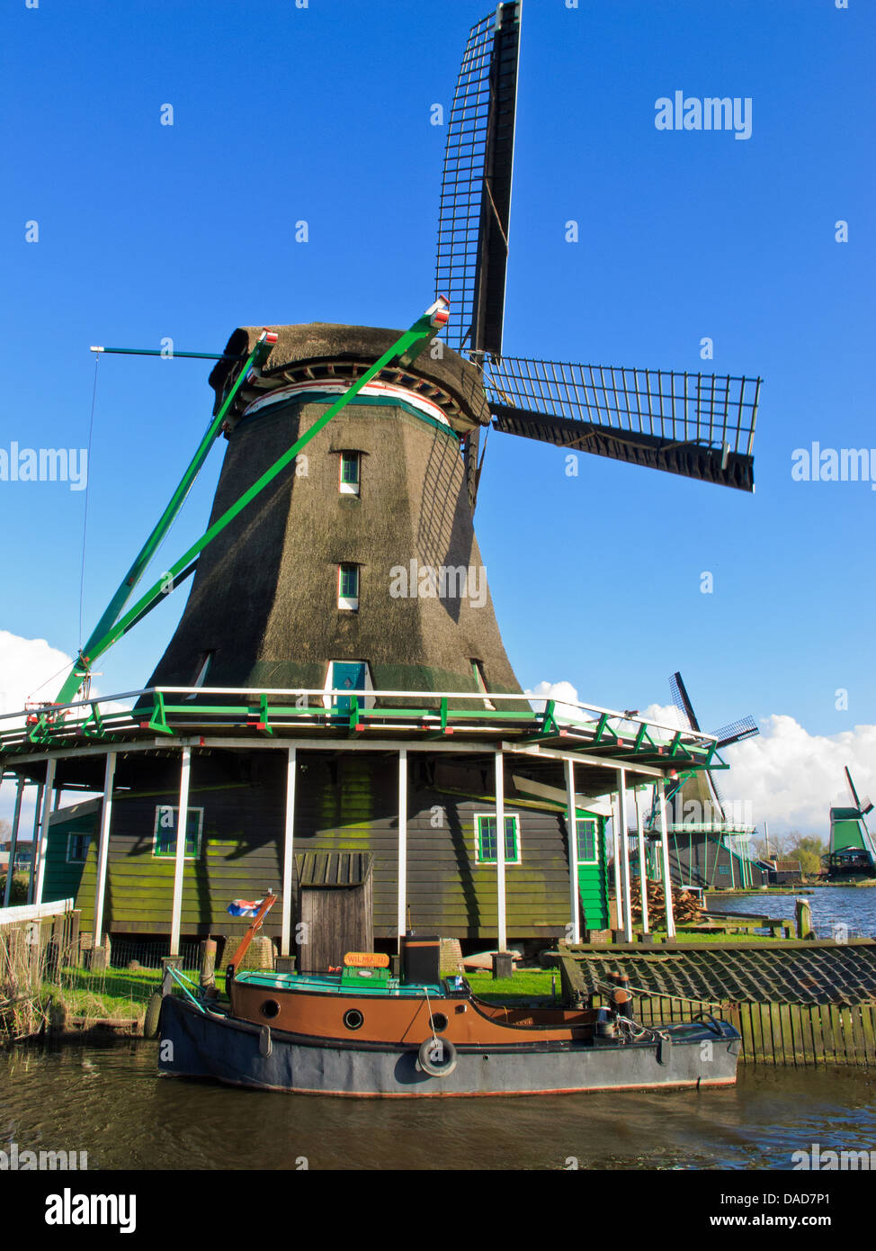 Old historic wind mills on the riverbank of Zaan river Stock Photo - Alamy