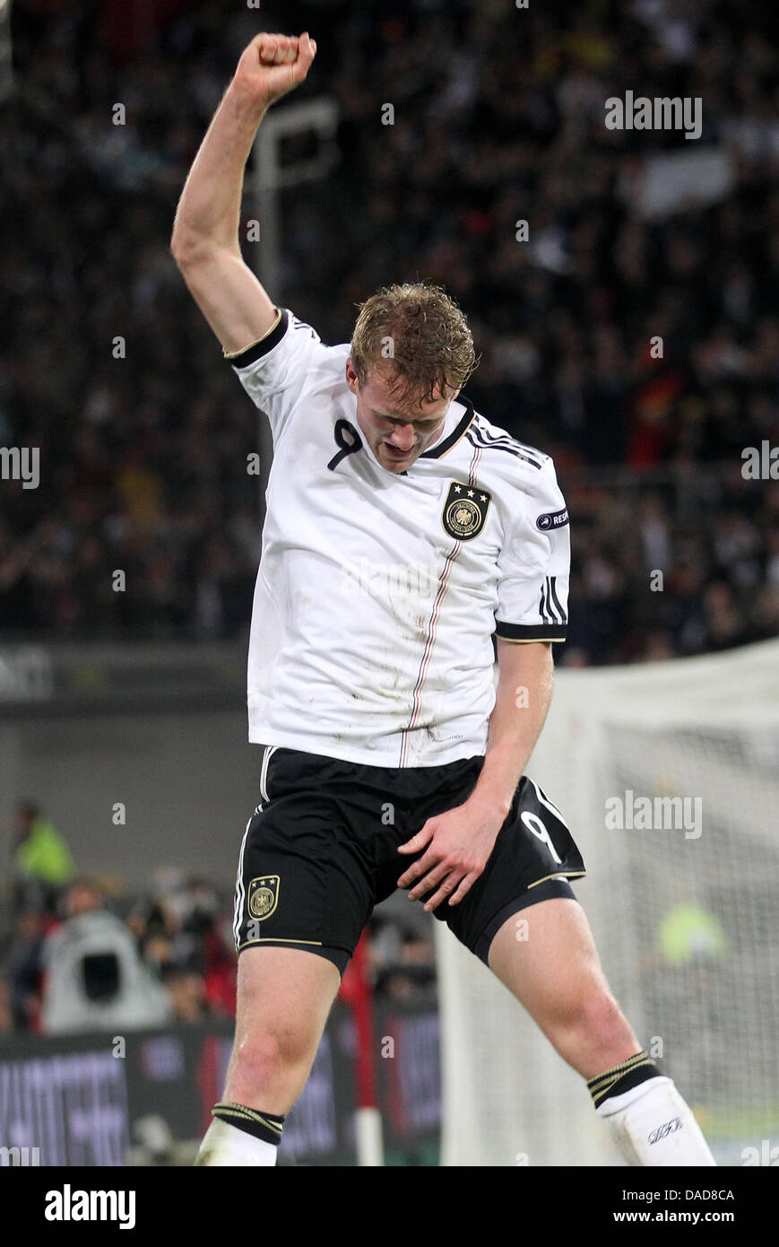 Germany's andre Schürrle celebrates after his goal during the Group A ...