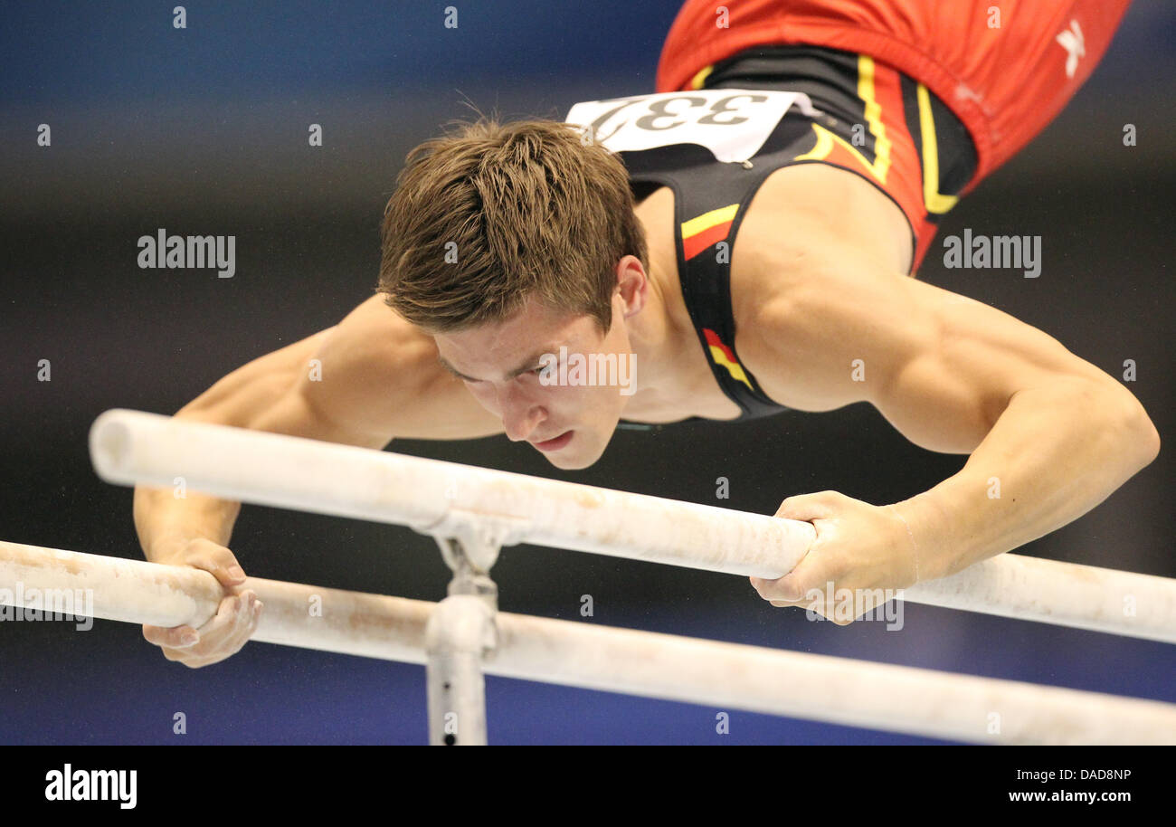 Artistic gymnastics mens parallel bars final hi-res stock photography ...
