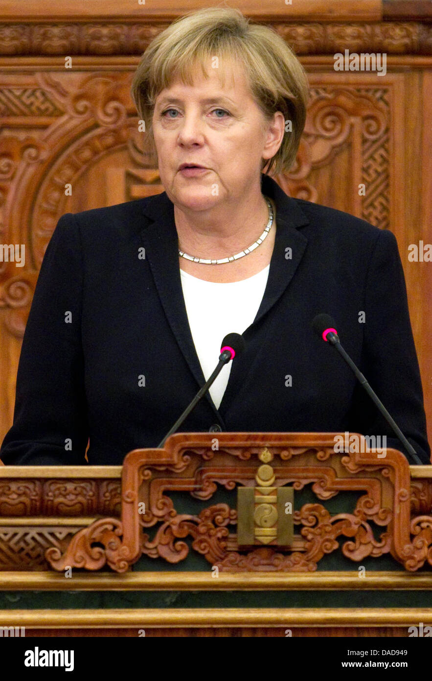 German Chancellor Angela Merkel speaks at the Mongolian parliament in ...