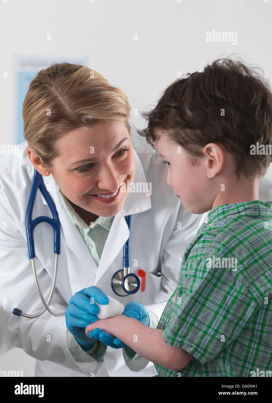 Caring female doctor hi-res stock photography and images - Alamy