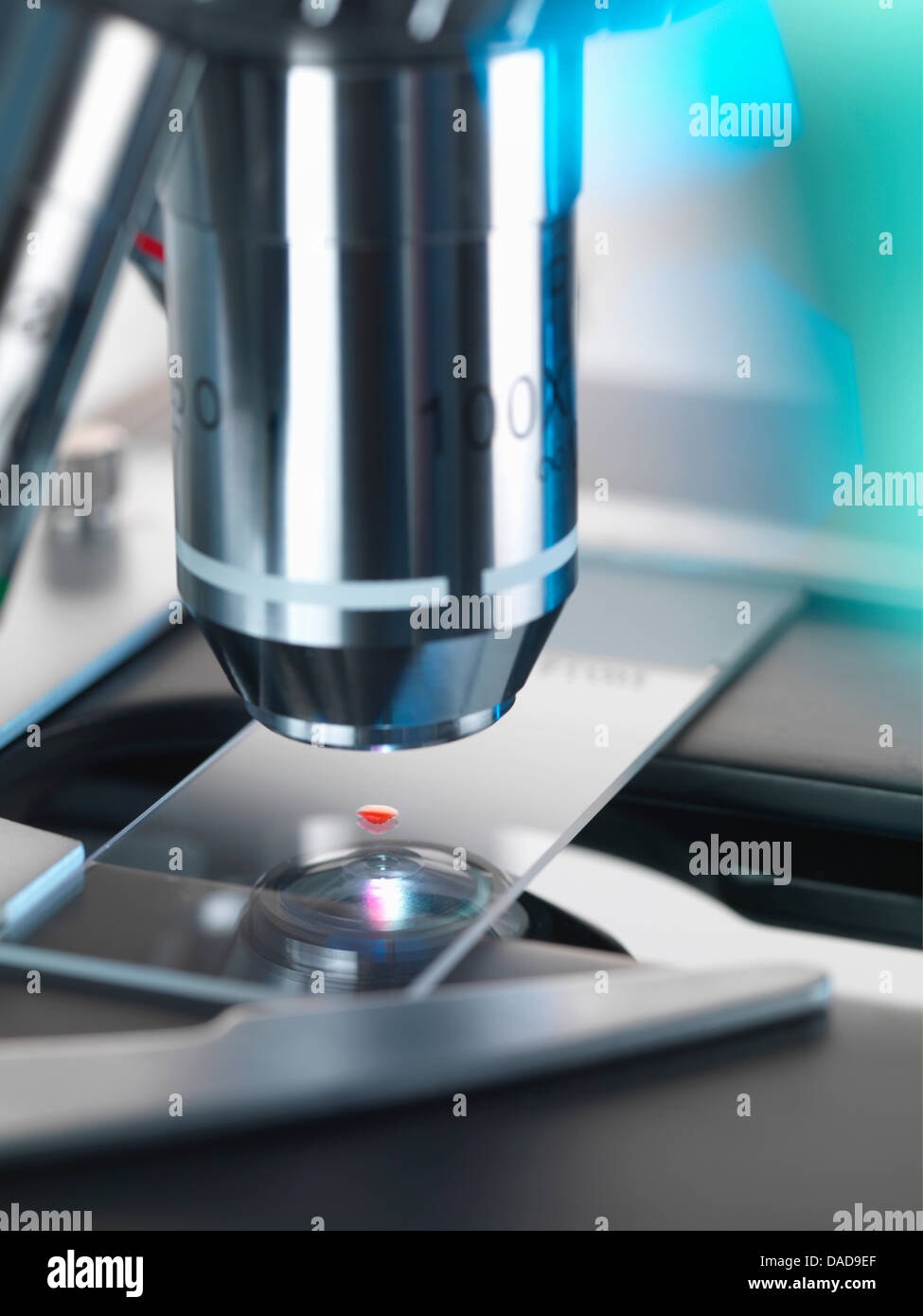 Blood testing, A light microscope examining a sample of blood in a lab ...