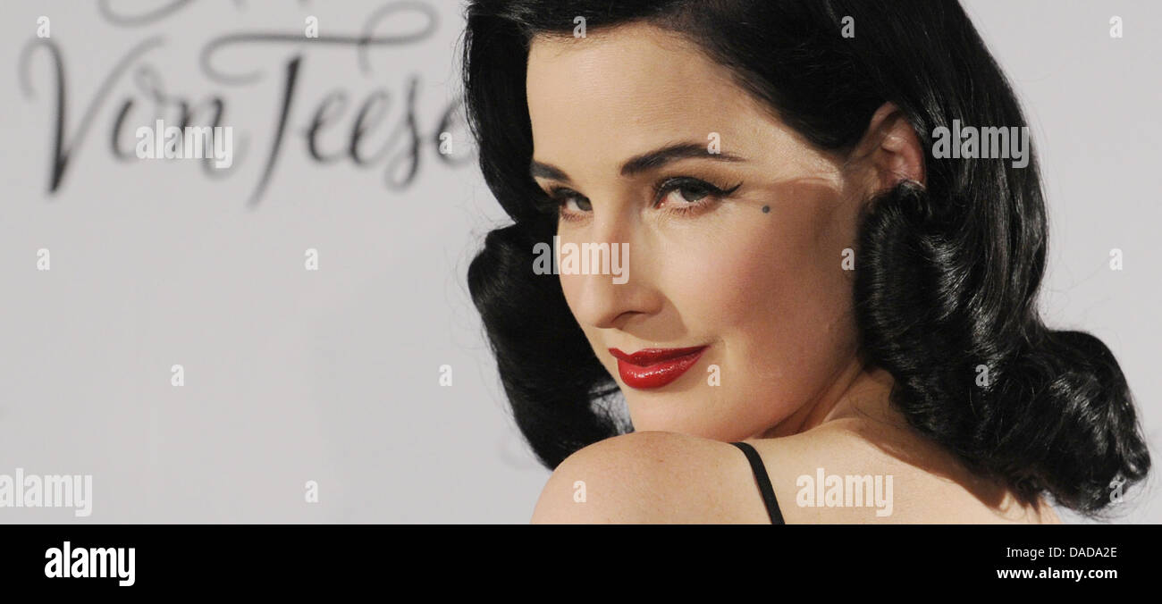 Burlesque model and actress Dita von Teese poses for the cameras at the ...