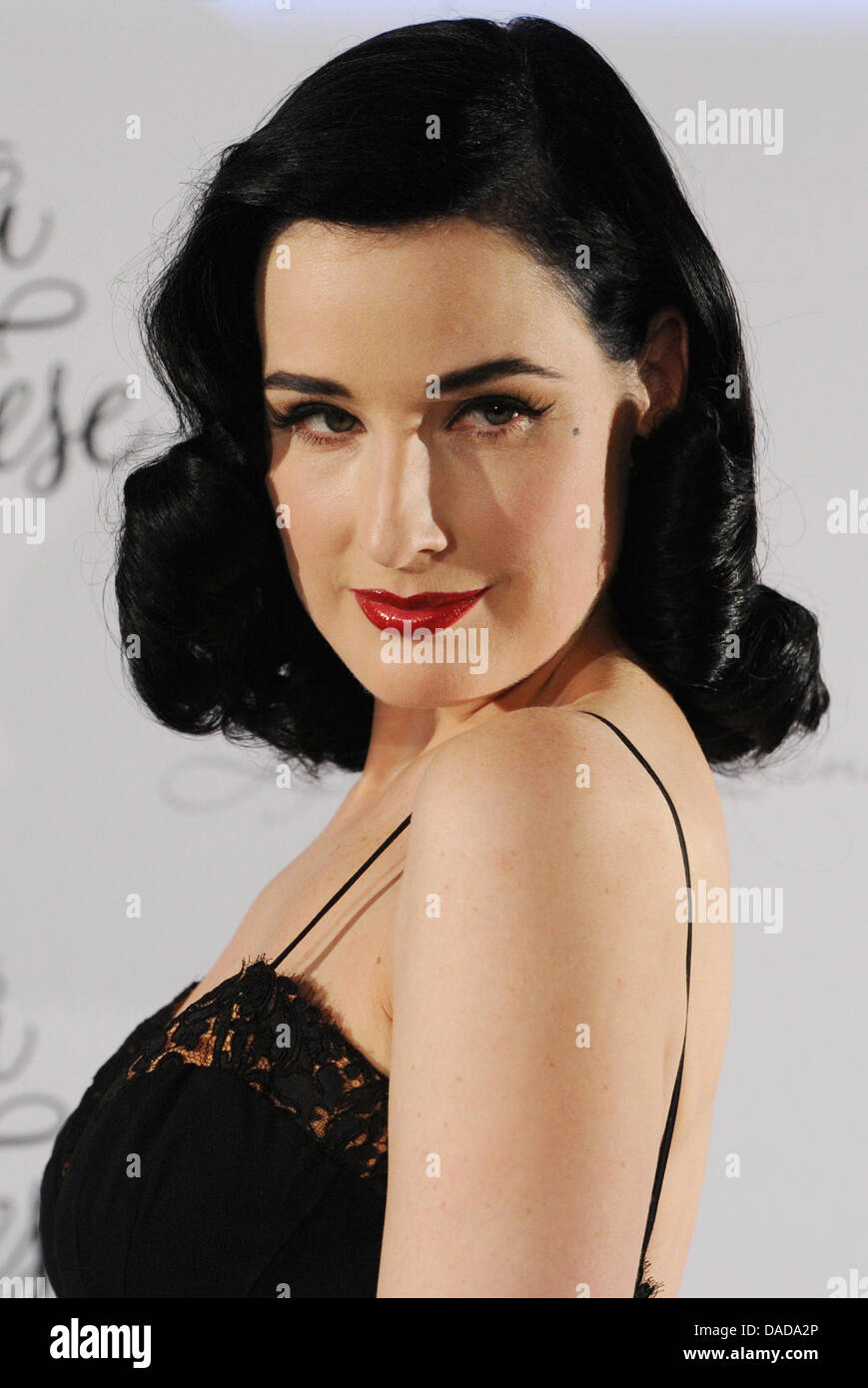 Burlesque model and actress Dita von Teese poses for the cameras at the ...