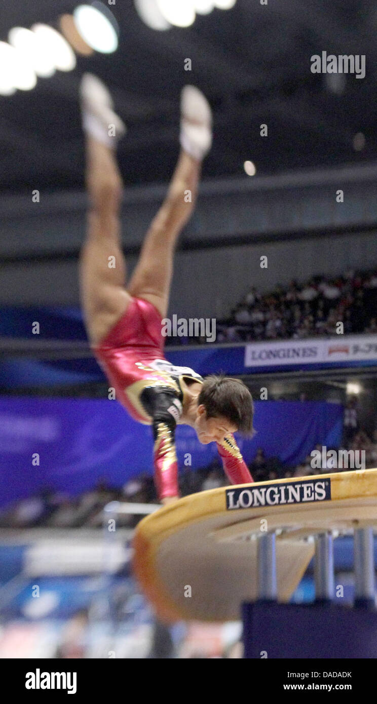 Silver medal gymnast Oksana Chusovitina of Germany performs vaulting ...