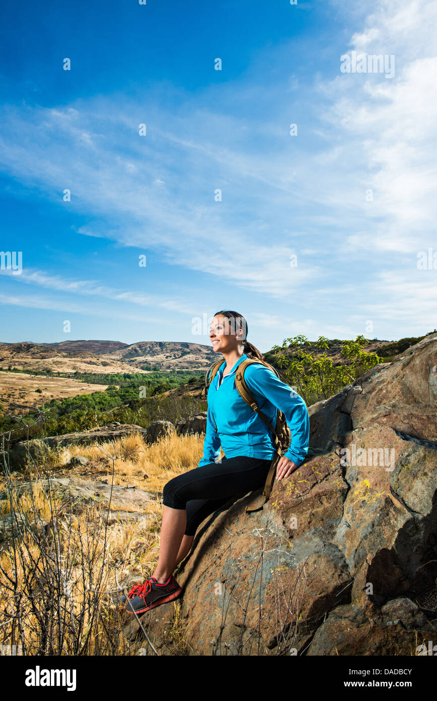 Hiker sitting on rock hi-res stock photography and images - Alamy