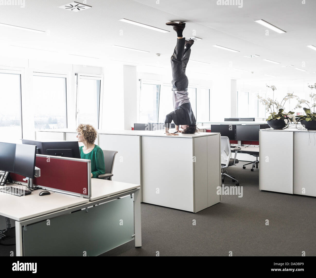 Man doing headstand hi-res stock photography and images - Alamy