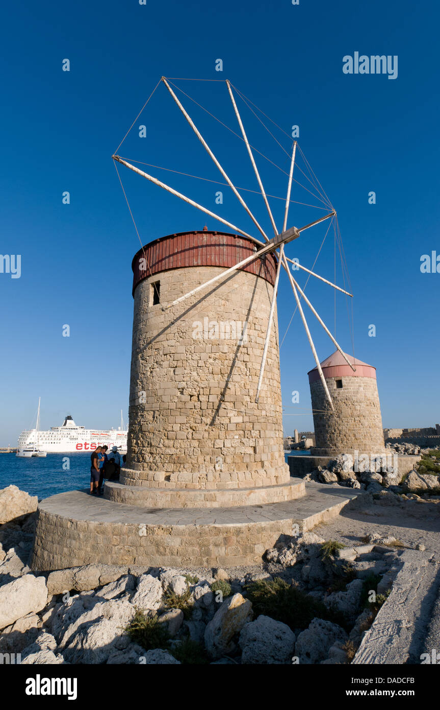 Medieval windmills at Mandraki port of Rhodes, Greece Stock Photo - Alamy