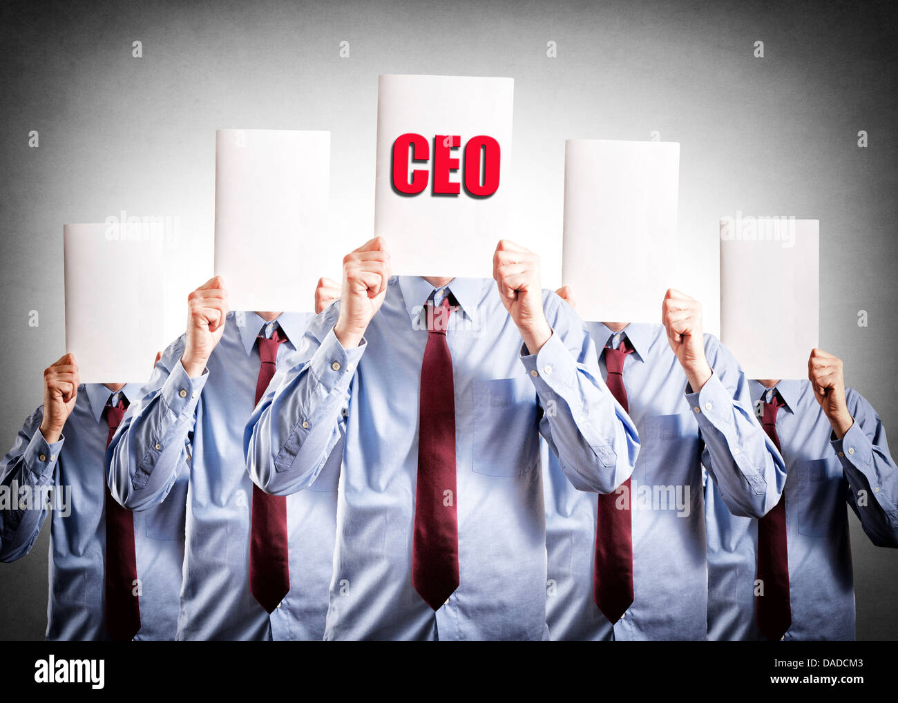 CEO holdings paper over his heads Stock Photo - Alamy