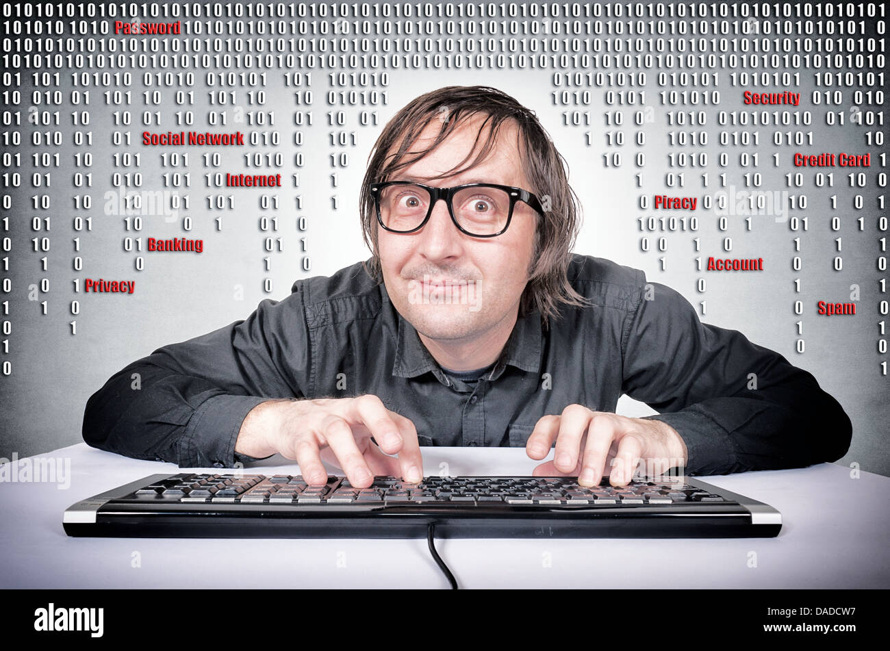 Funny hacker in action on his keyboard Stock Photo - Alamy