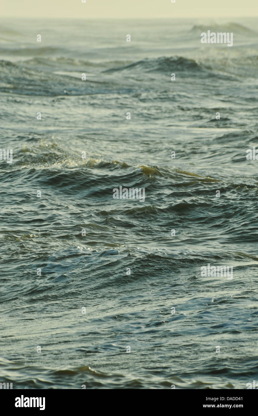 Scene of small waves and ripples on surface of sea water during an ...