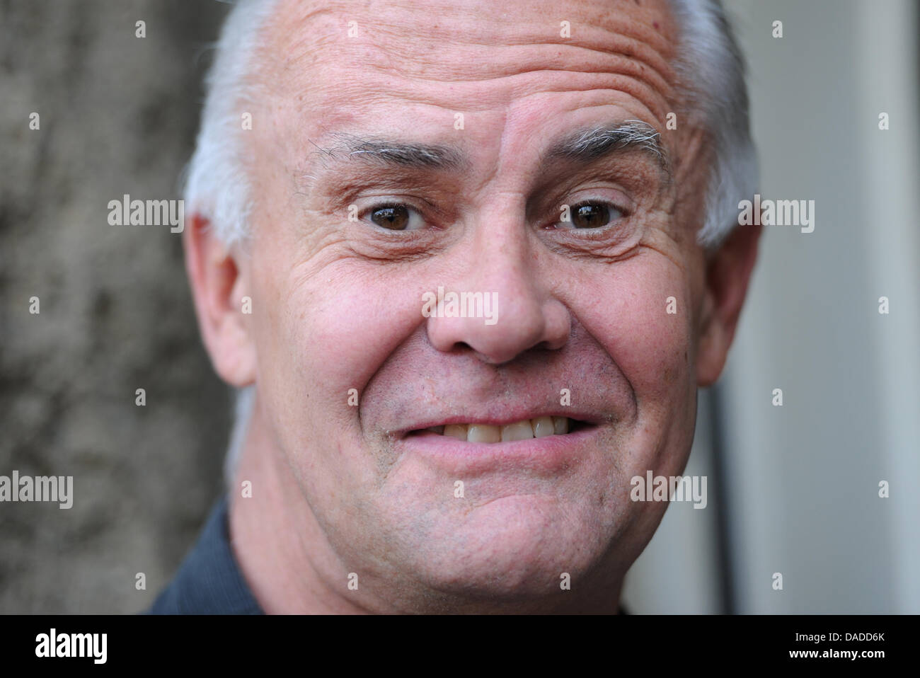Poetry slam founder Marc Smith stands in front of a cafe in Hamburg ...