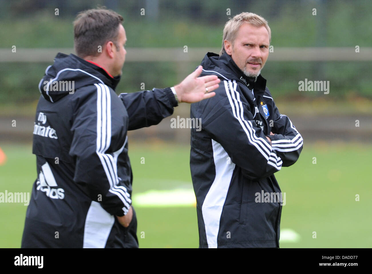 Hamburg's new head coach Thorsten Fink stands with his new assistant ...