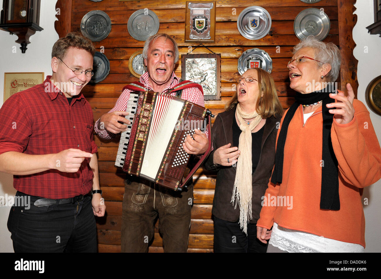 Yodelling hi-res stock photography and images - Alamy