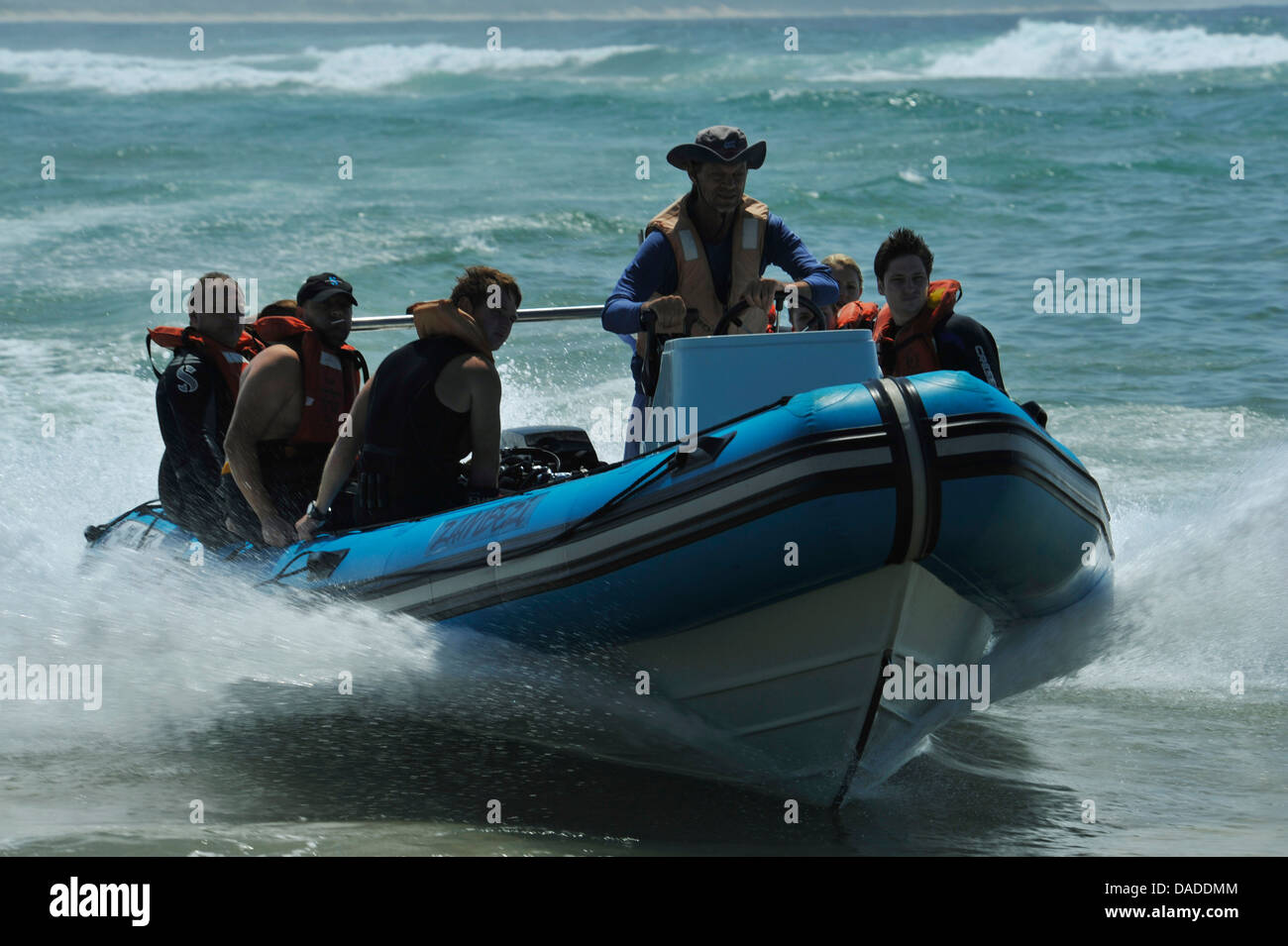 Scuba diving boat racing towards beach at end of reef dive at Sodwana ...