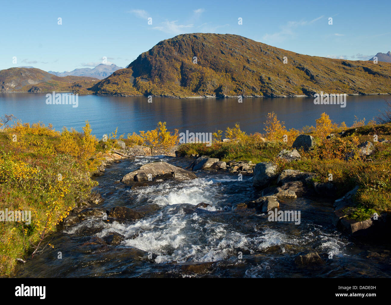 A colourful autmn landscape stretches across the slops and inlets near ...