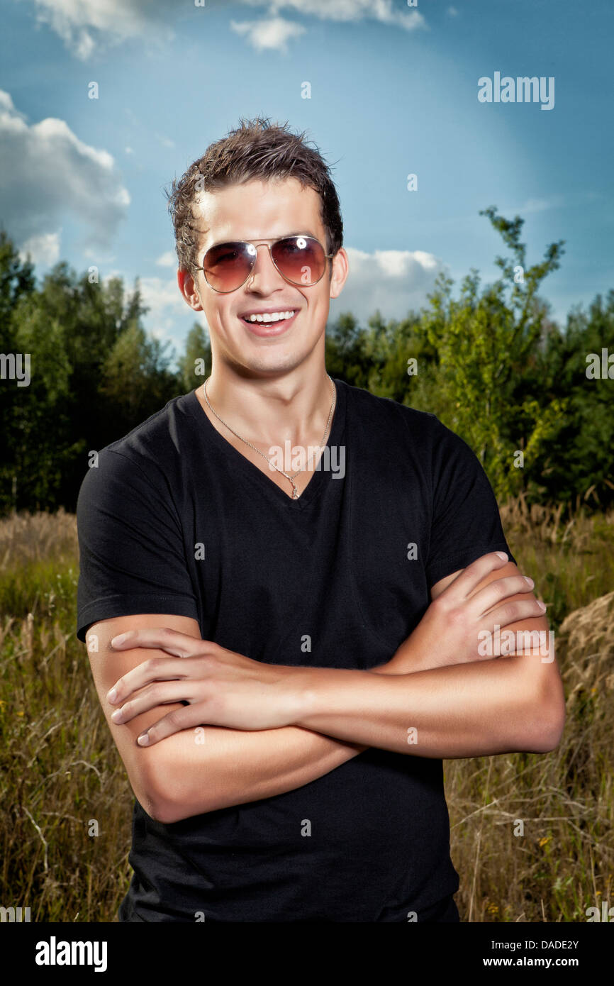 smile young man, summer outdoor Stock Photo - Alamy