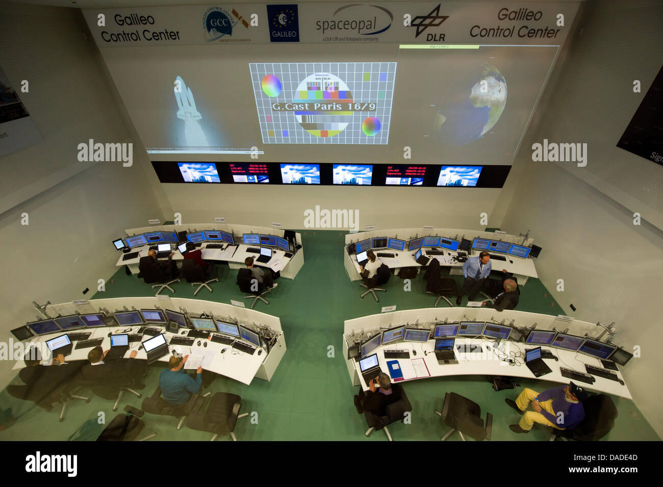 Scientists and technicians sit in the control room of the German ...