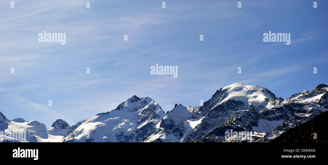 Parts of the Bernina Range can be seen above Pontresina, Switzerland ...