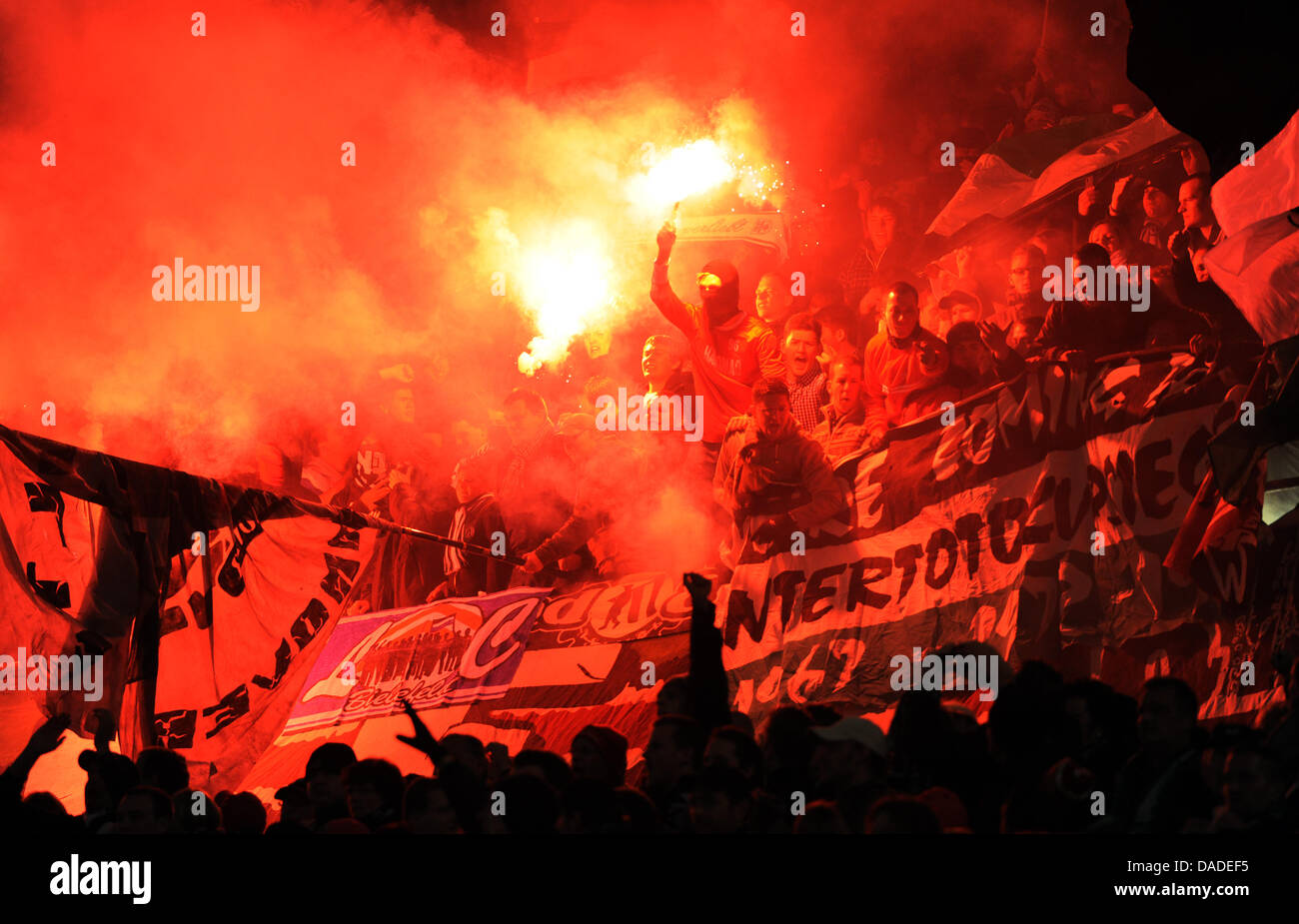 Hanover's fans cheer after their team scored the first goal during the ...