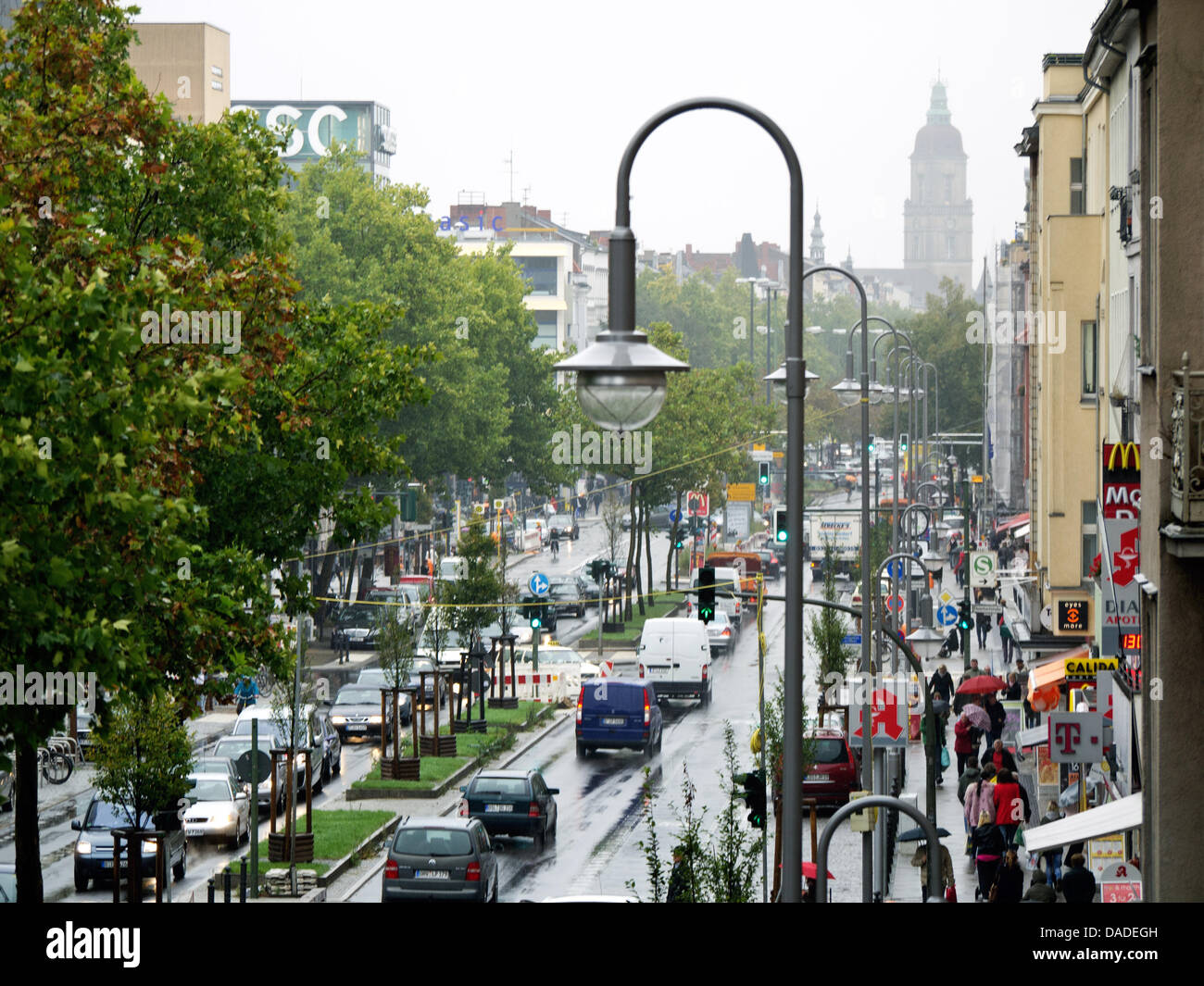 People stroll along the shopping street Schlossstrasse in Berlin ...
