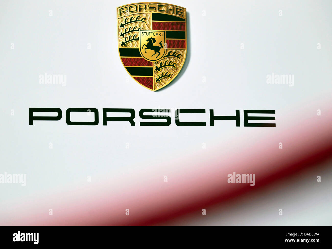The logo of car manufacturer Porsche on display after the foundation ...