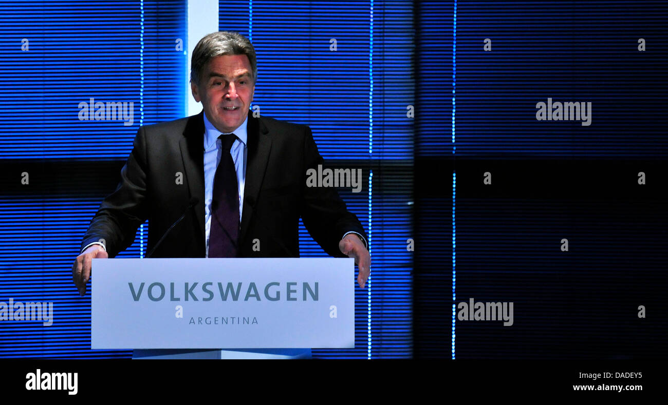 The head of Volkswagen Argentinia, Viktor Klima, stands on a podium ...