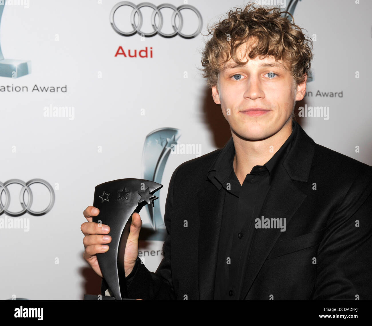 Singer Tim Bendzko celebrates his award at the gala for the 'Audi ...