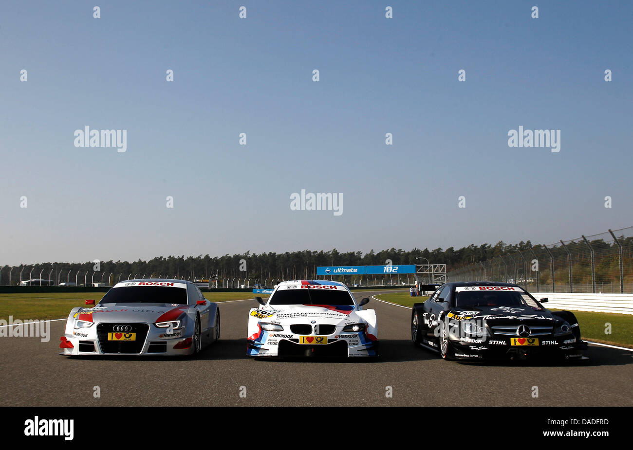 The new racing cars for the upcoming season drive on the racing track ...