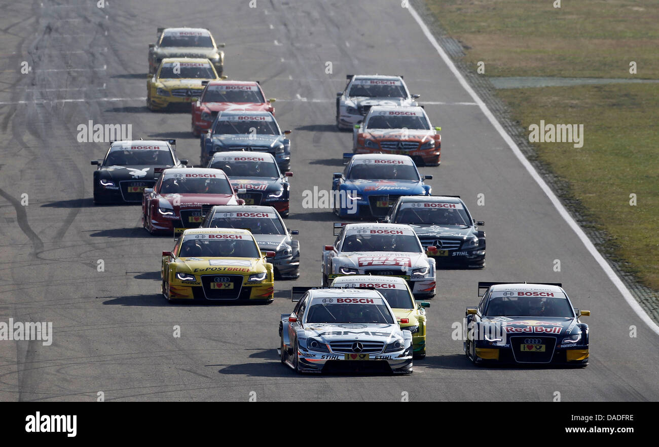 British Racing driver Jamie Green (front) from AMG Mercedes is in the ...