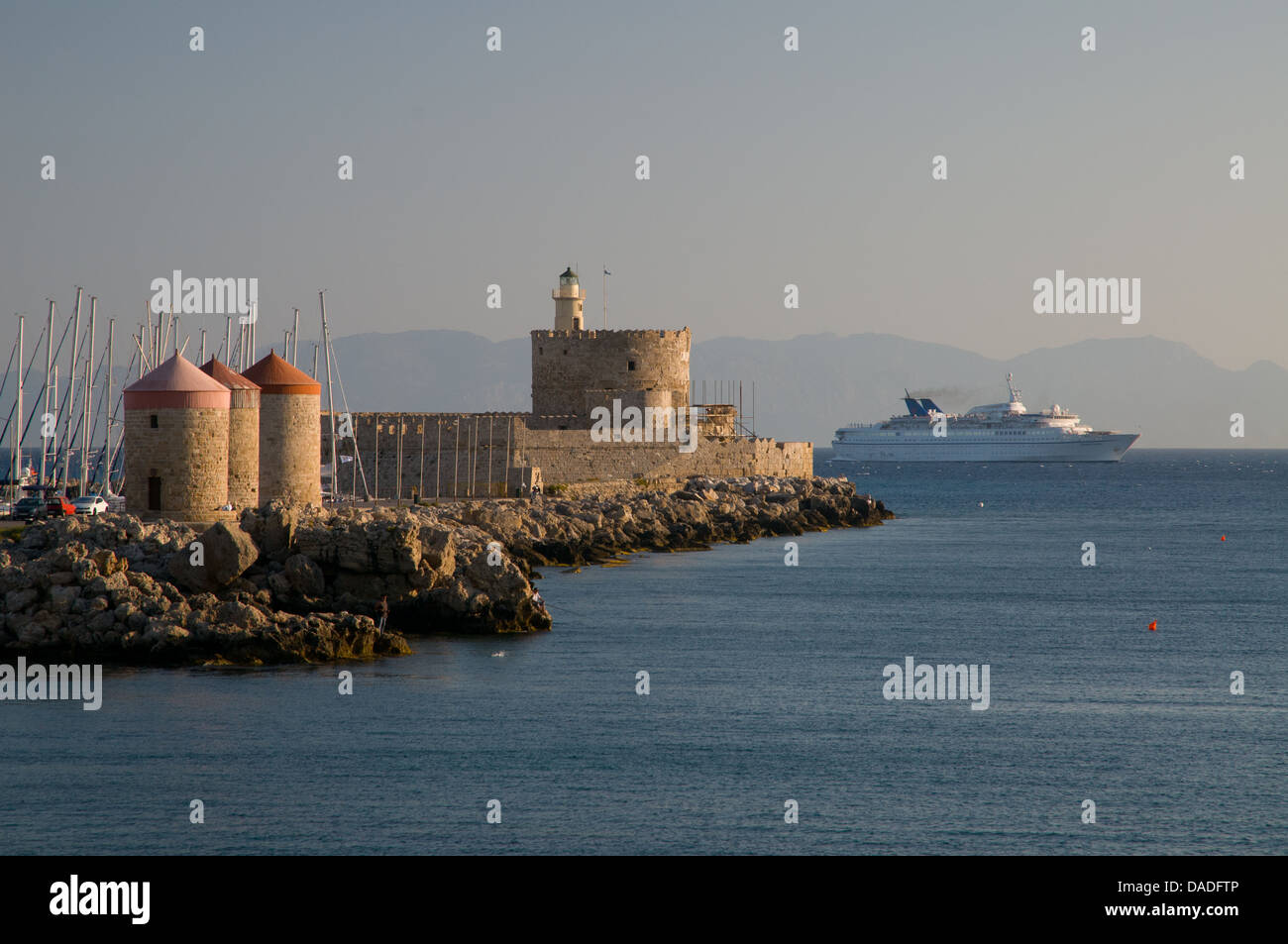 Ferry in Aegean Sea, port of Rhodes, Fort of St Nicholas with medieval ...