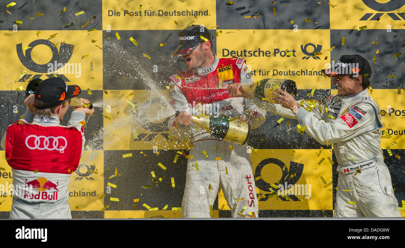 The German racing driver Martin Tomczyk (C) of Audi Sport Team Phoenix ...