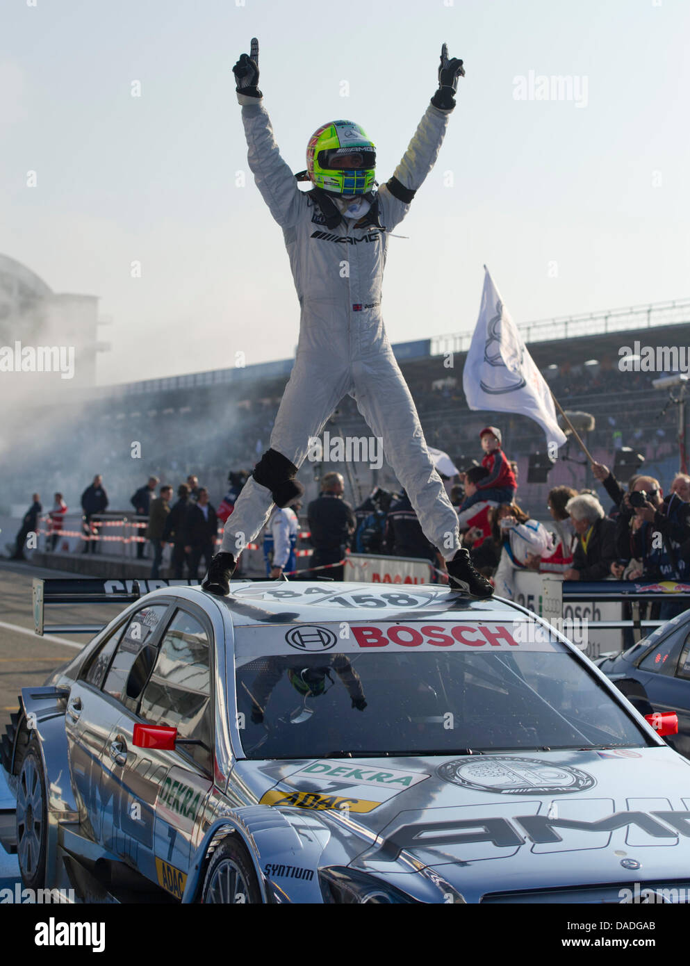 British racing driver Jamie Green celebrates his victory in the German ...