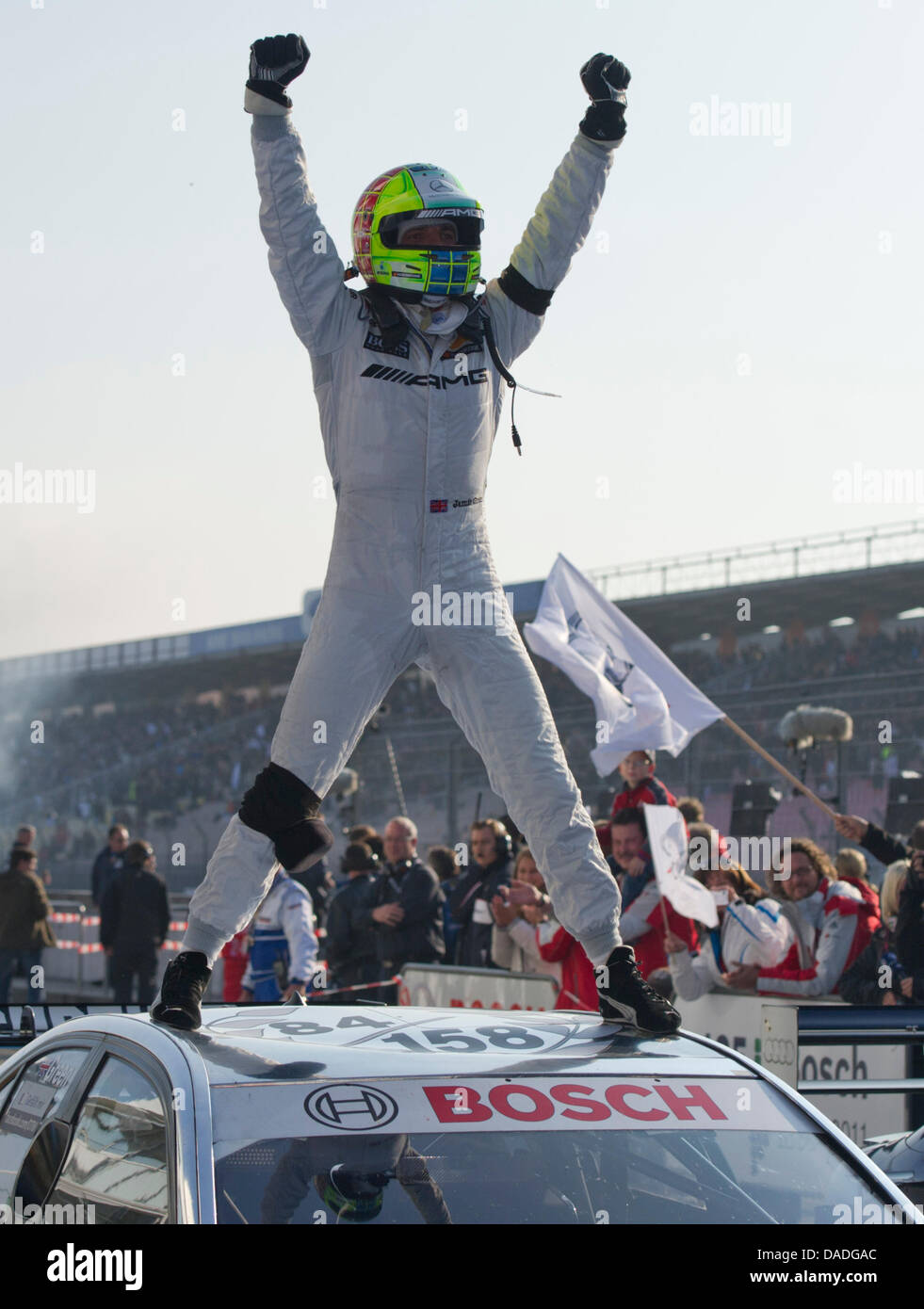 British racing driver Jamie Green celebrates his victory in the German ...