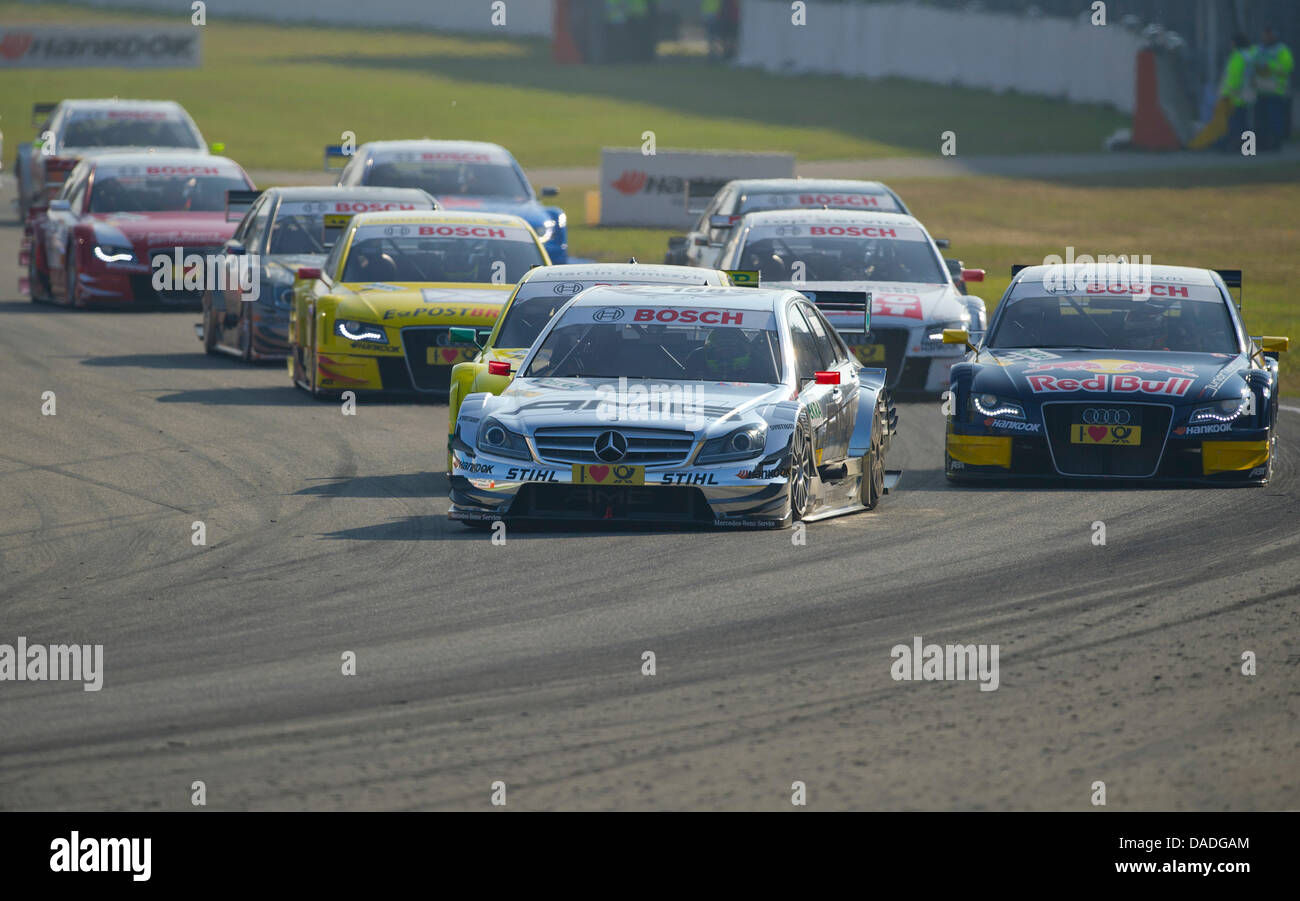 British racer Jamie Green (FRONT) of AMG Mercedes leads the German ...