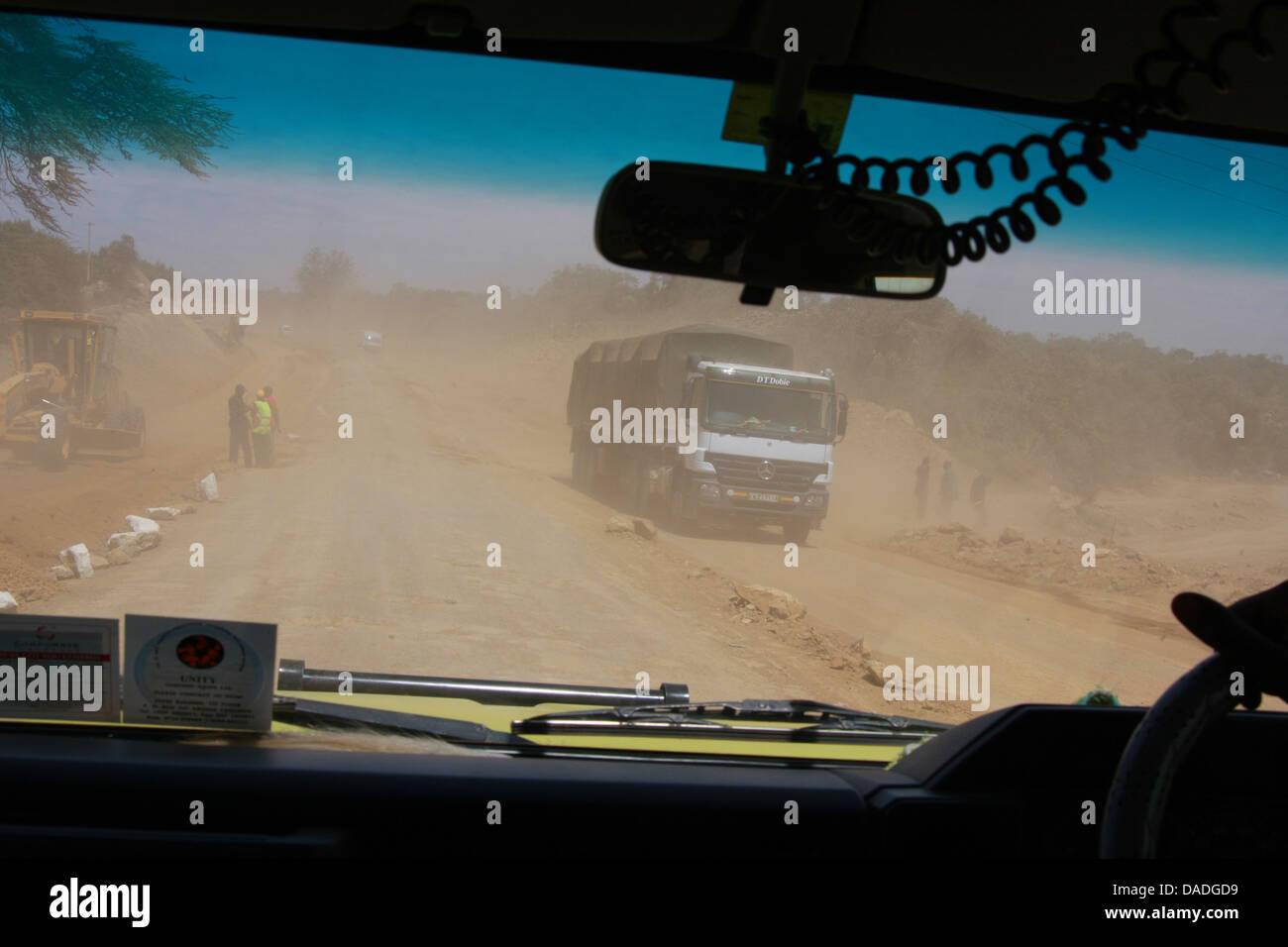 Driving car on dusty road hi-res stock photography and images - Alamy