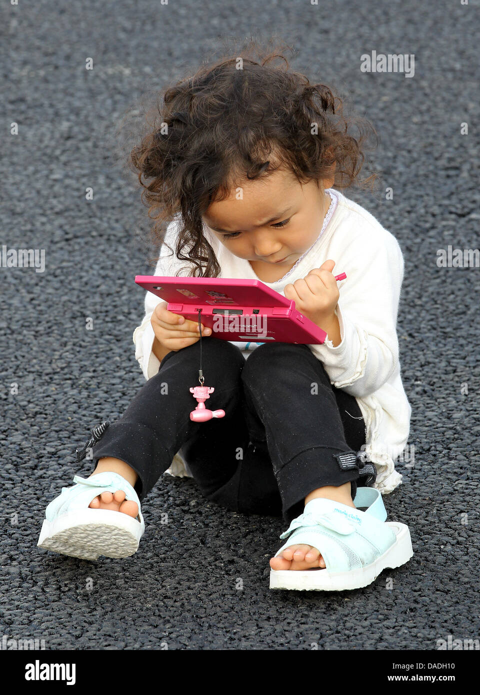 A Japanese girl wait for the arrival of German President Christian ...