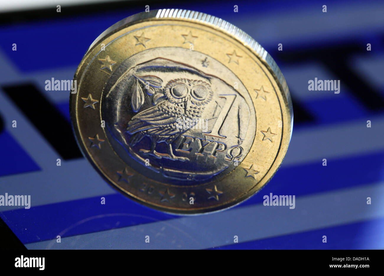An owl is seen on the back of a Greek one Euro coin in Schwerin ...
